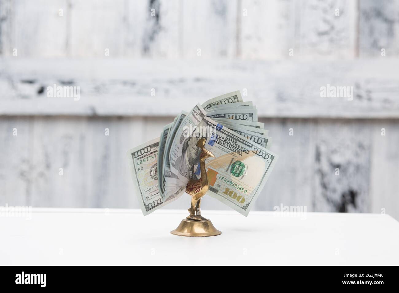 Feather money hi-res stock photography and images - Alamy