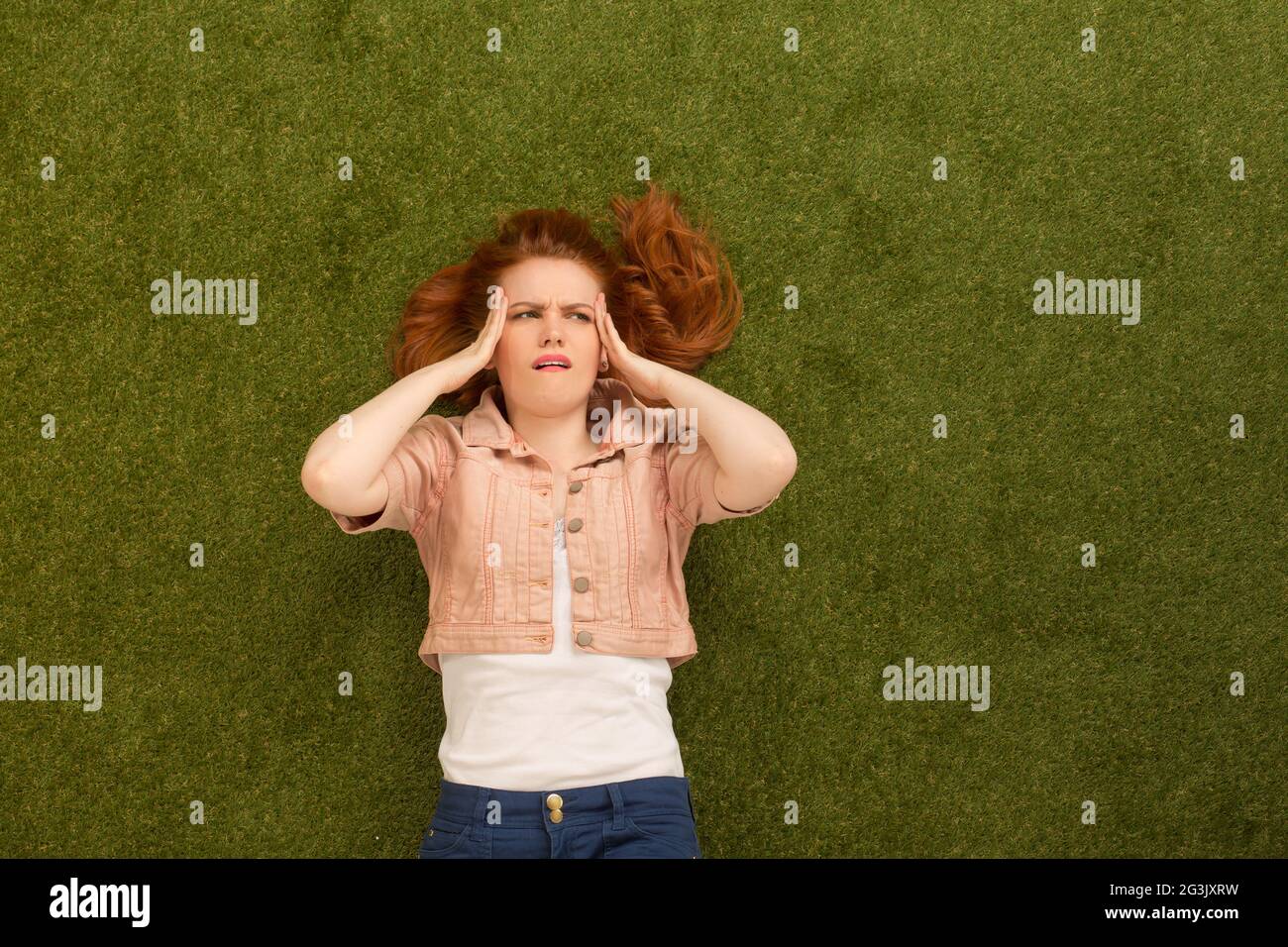Beautiful woman on grass Stock Photo - Alamy