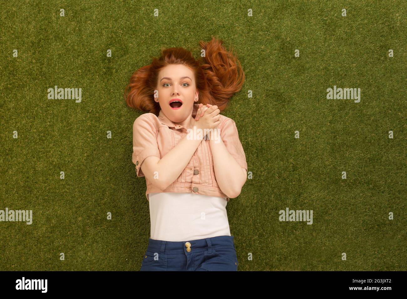 Beautiful woman on grass Stock Photo - Alamy