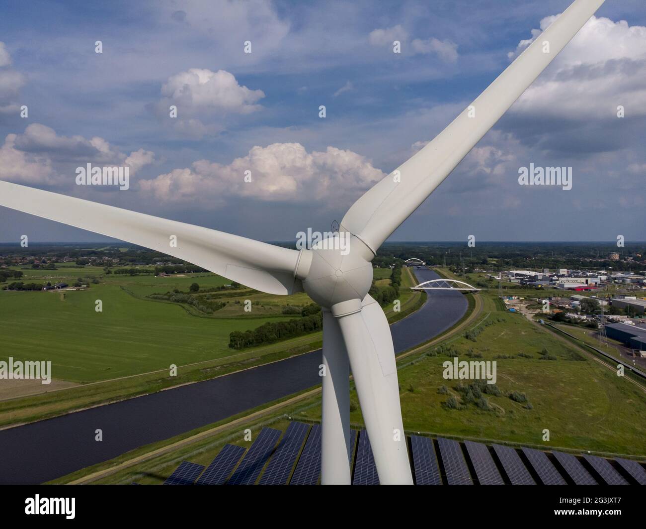 Windmill sustainable energy concept Stock Photo - Alamy