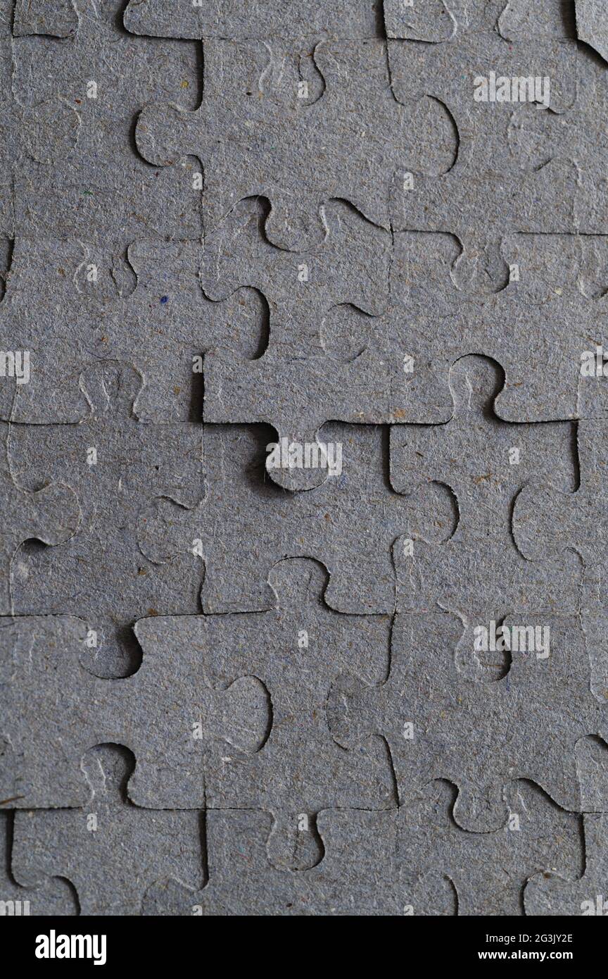 Grey puzzle pieces hi-res stock photography and images - Alamy