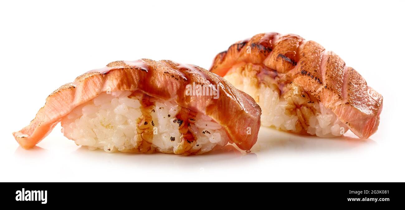 burnt salmon sushi with soy sauce isolated on white background macro ...
