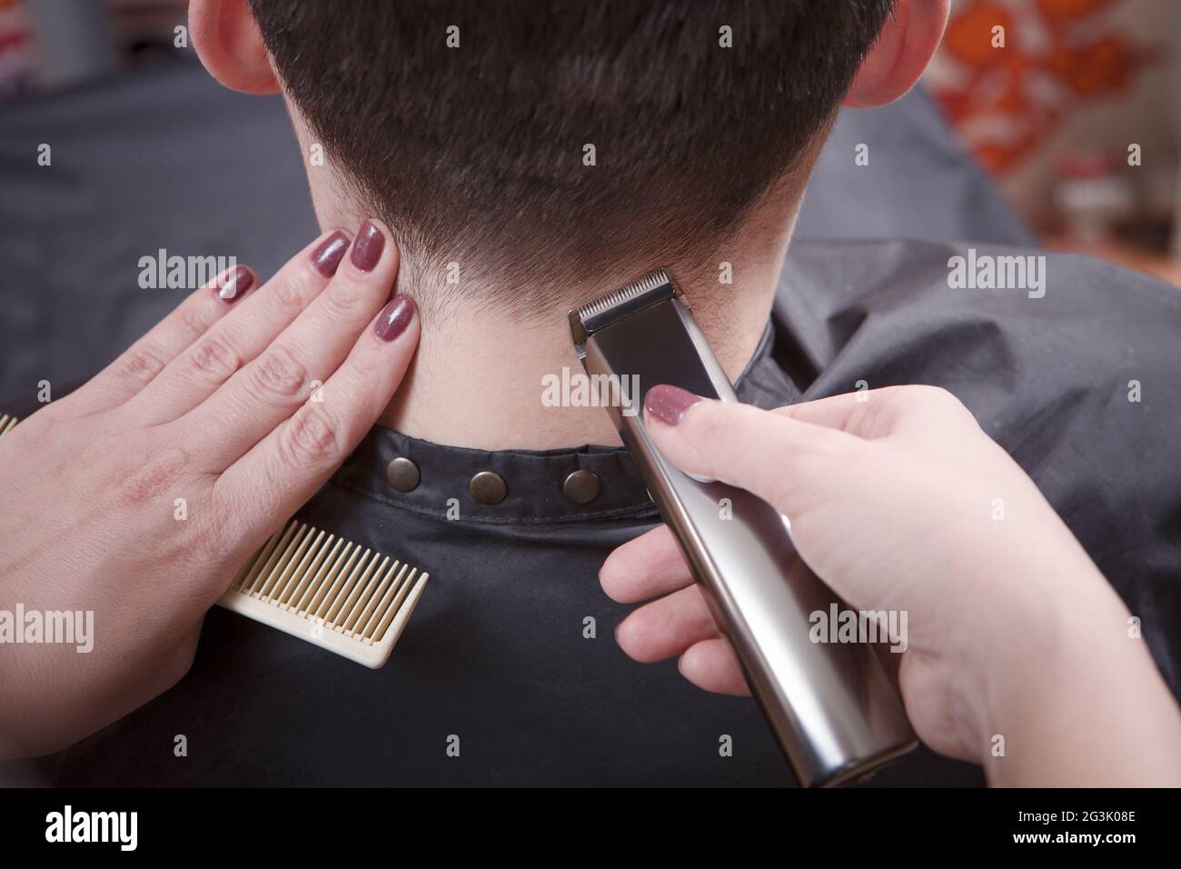 Handsome man in hairdressing saloon Stock Photo - Alamy
