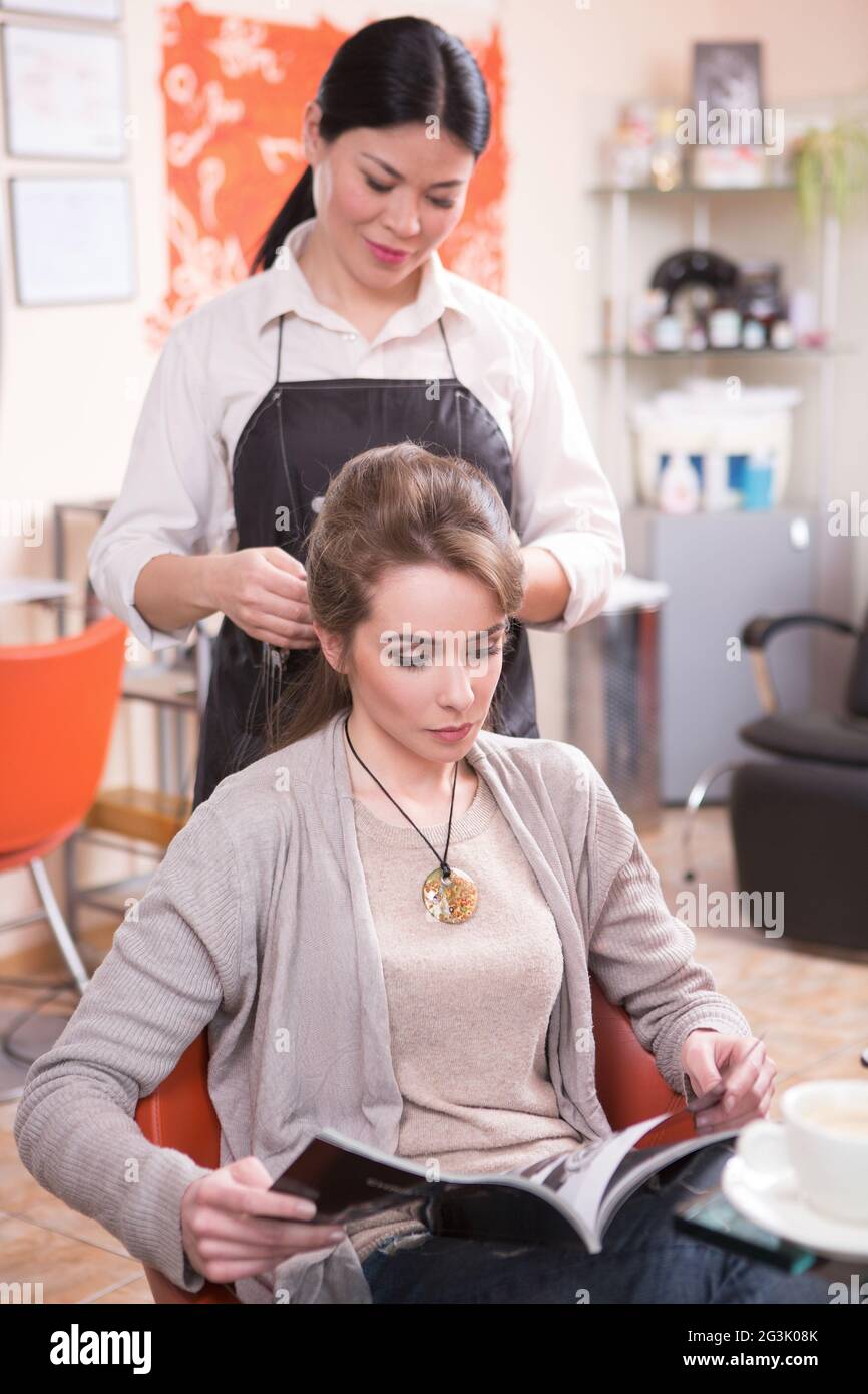 Beautiful lady in hairdressing saloon hi-res stock photography and ...