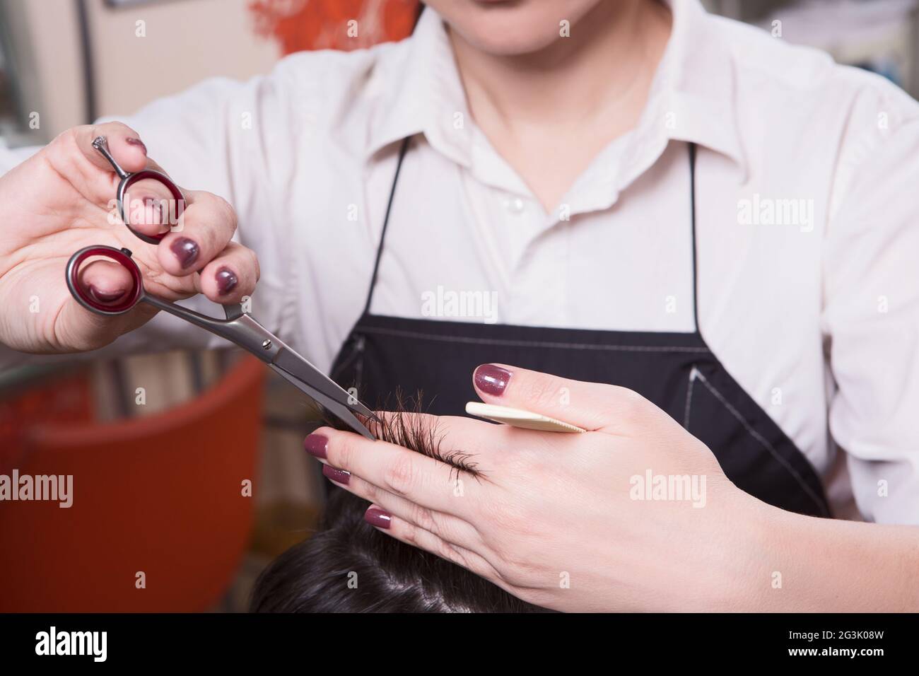 Handsome man in hairdressing saloon Stock Photo - Alamy