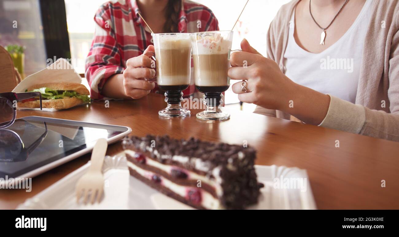 Best friends ladies in cafe Stock Photo - Alamy