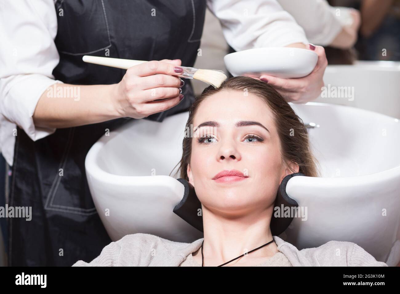 Lady washing hands hi-res stock photography and images - Alamy