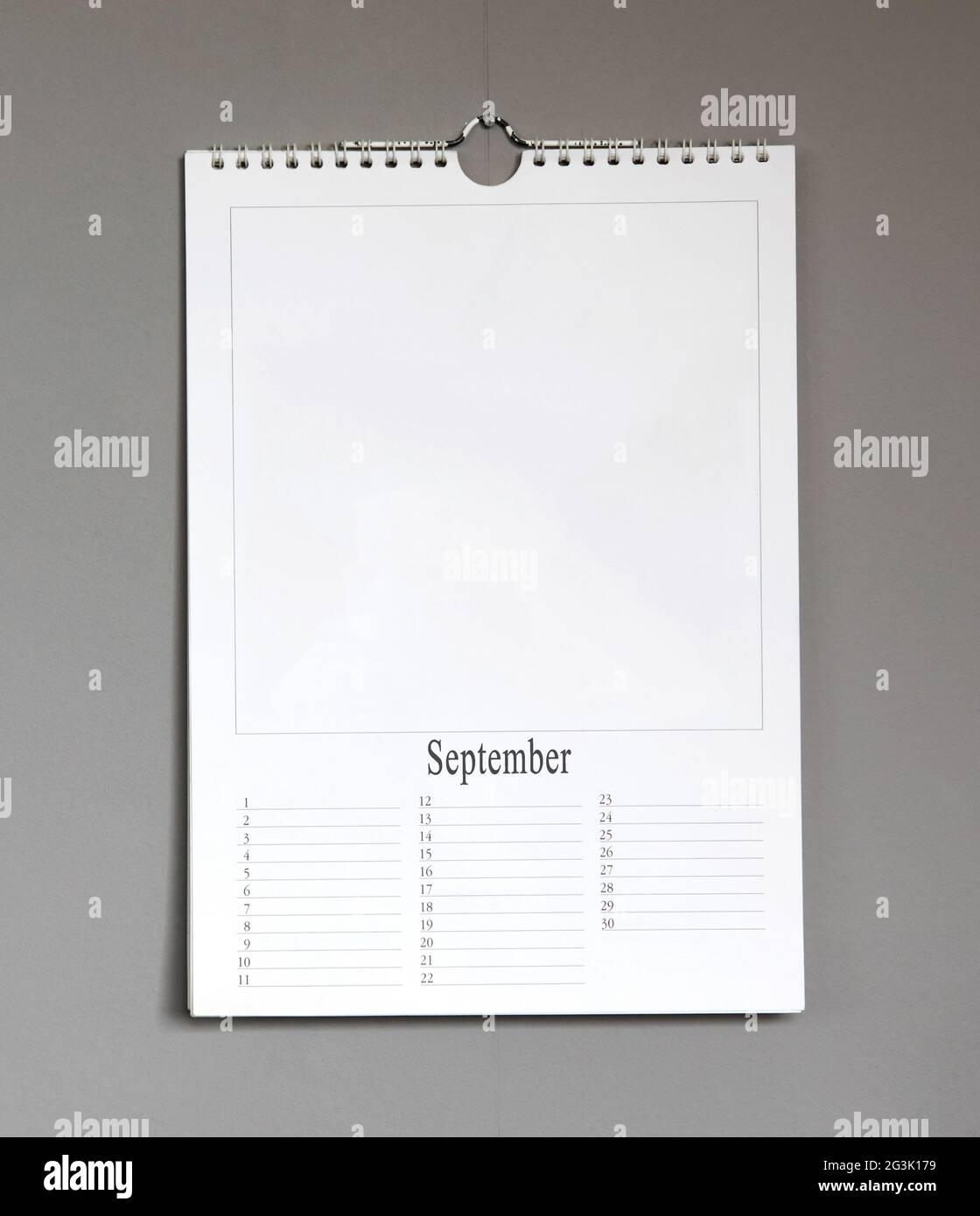 Simple old birthday calendar hanging on a grey wall - September Stock ...