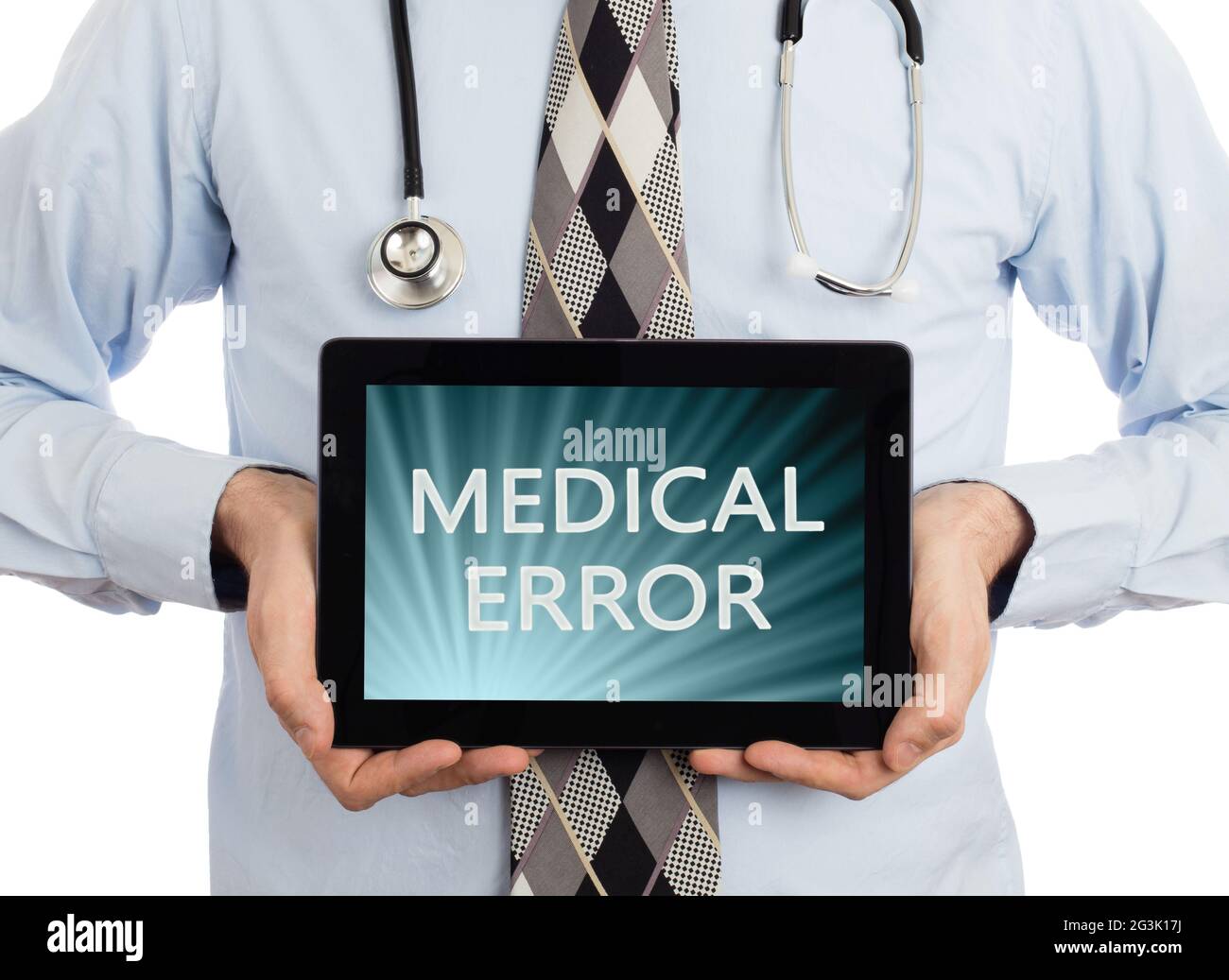 Doctor holding tablet - Medical error Stock Photo - Alamy