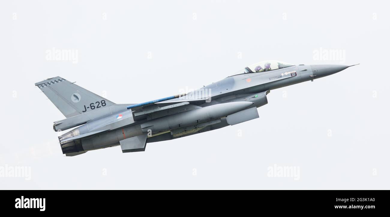 LEEUWARDEN, THE NETHERLANDS - JUN 11, 2016: Dutch F-16 fighter jet take off during the Royal ...