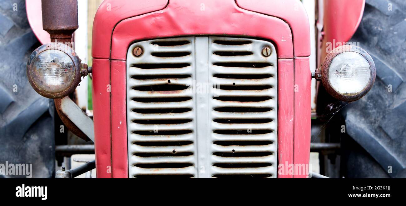 Old tractor face Stock Photo - Alamy