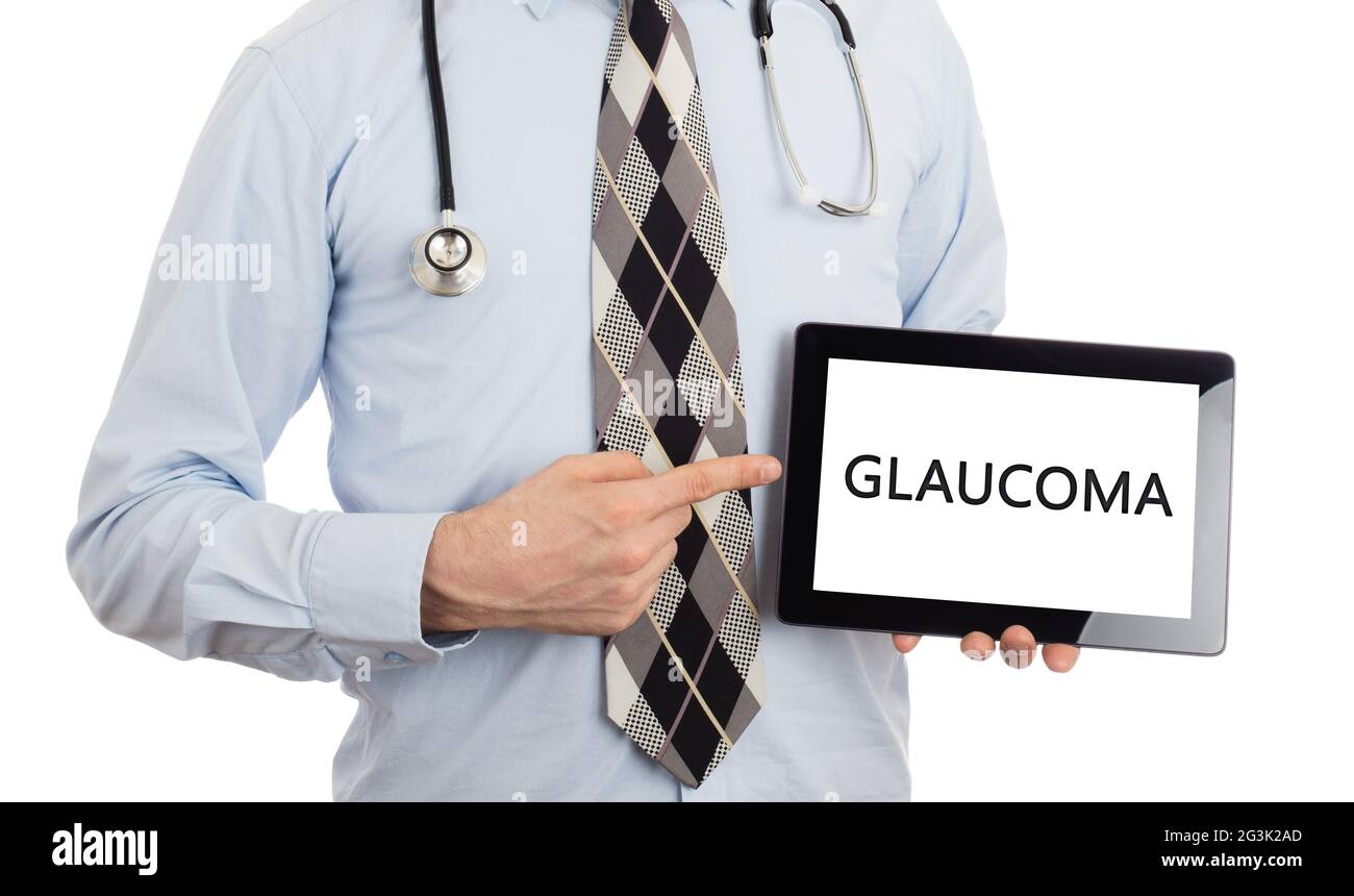 Doctor holding tablet - Glaucoma Stock Photo - Alamy