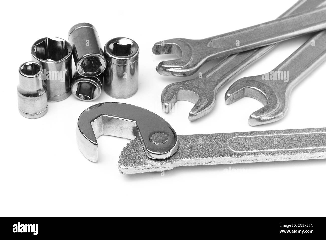 various types of wrenches: open, socket and self-adjusting on white ...