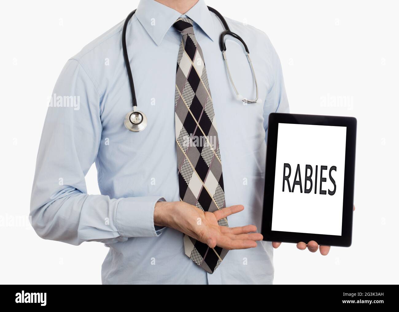 Doctor holding tablet - Rabies Stock Photo - Alamy