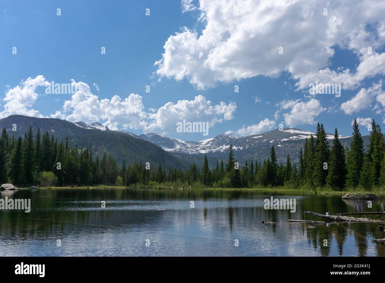 Snow capped mountains in spring scene in Colorado Stock Photo - Alamy