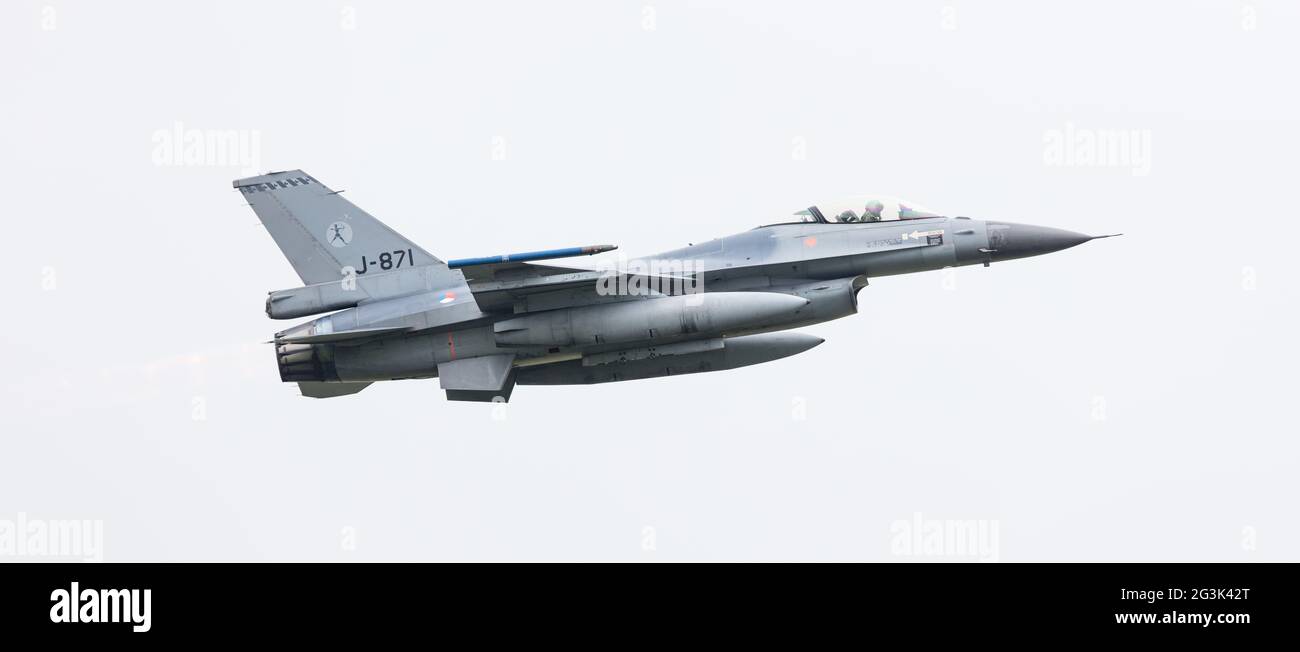 LEEUWARDEN, THE NETHERLANDS - JUN 11, 2016: Dutch F-16 fighter jet take off during the Royal ...