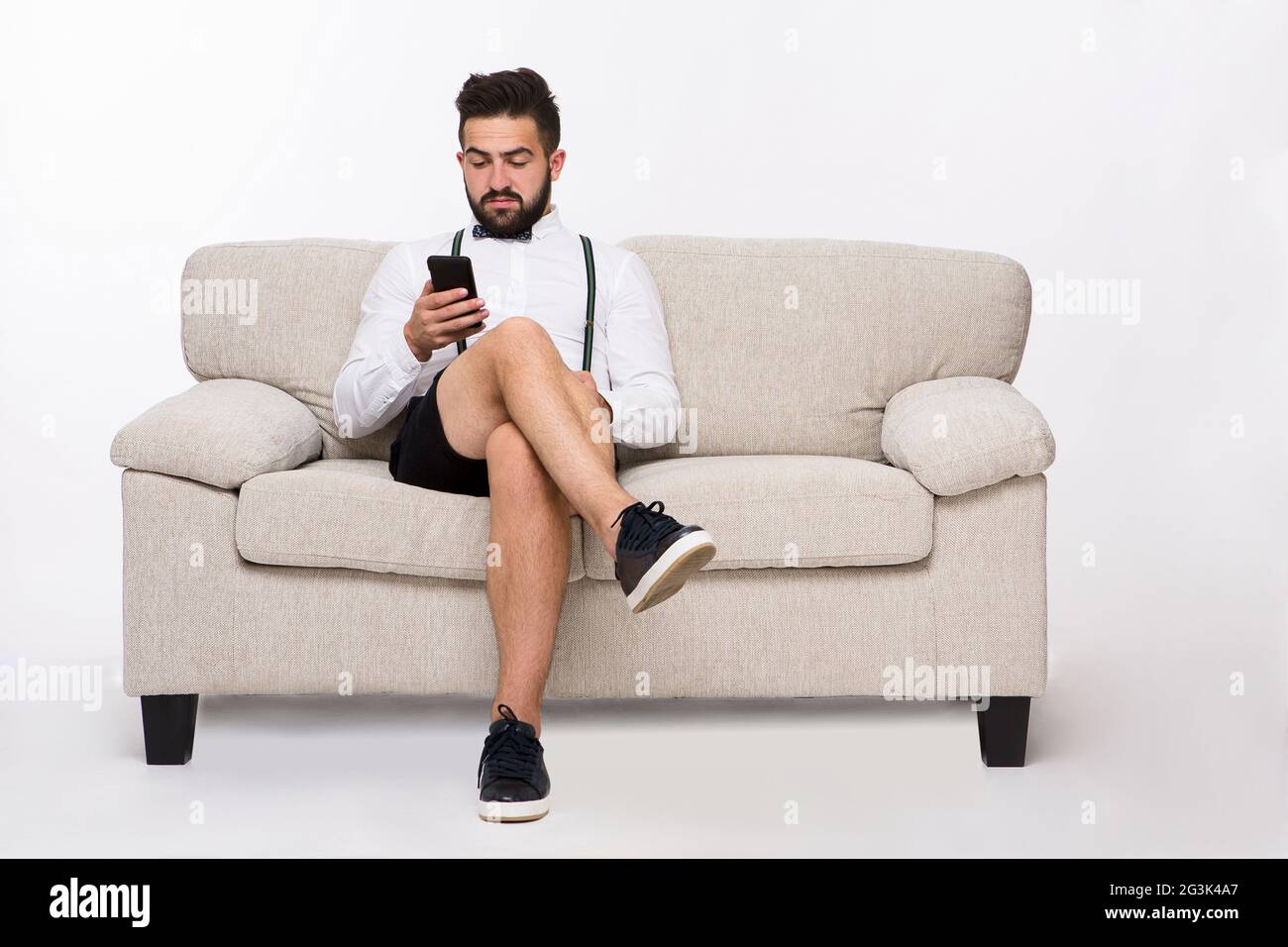 Cheerful man texting using mobile hi-res stock photography and images ...