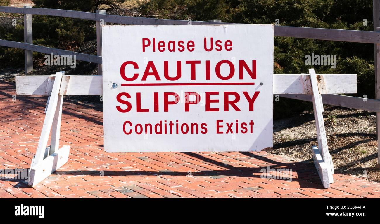 Warning sign of slippery ground hi-res stock photography and images - Alamy