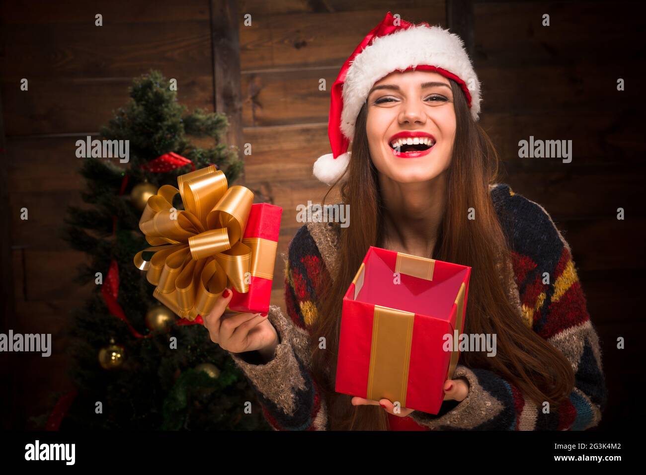Girl opening present hi-res stock photography and images - Alamy