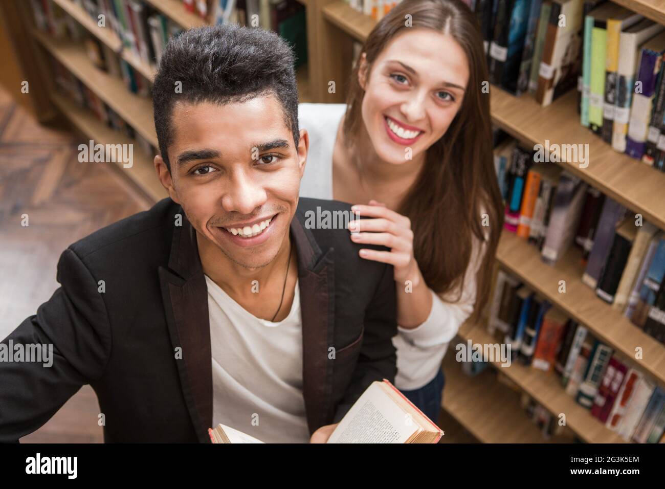 Library students table hi-res stock photography and images - Alamy