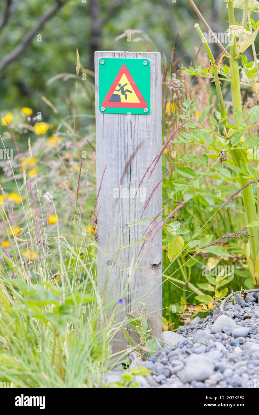 Green square sign - Warning for risk of falling Stock Photo - Alamy