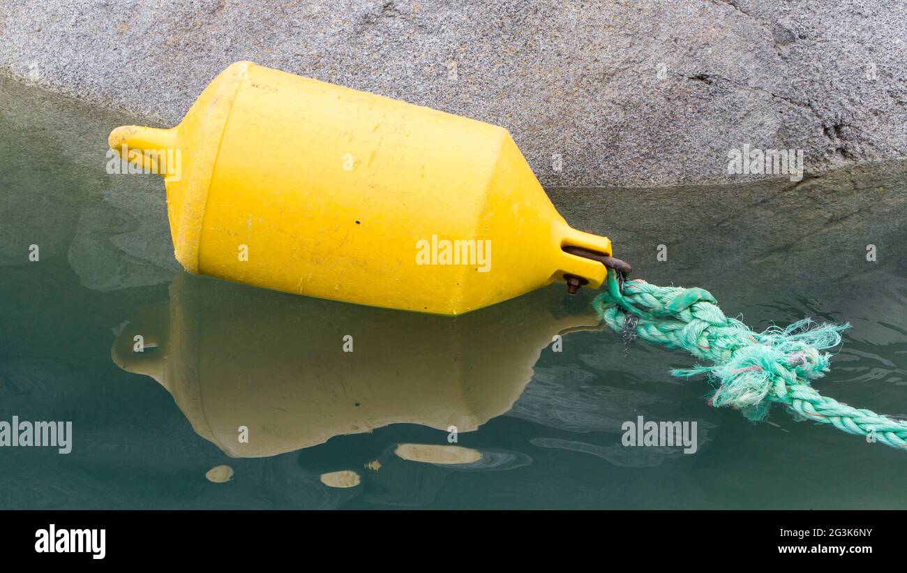 Inflatable yellow fender Stock Photo - Alamy