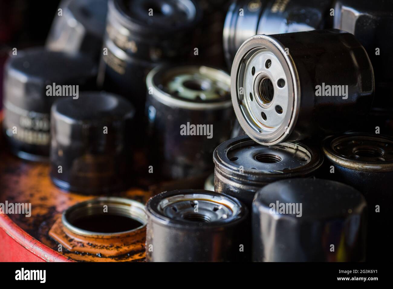 Automobile oil filters background Stock Photo - Alamy