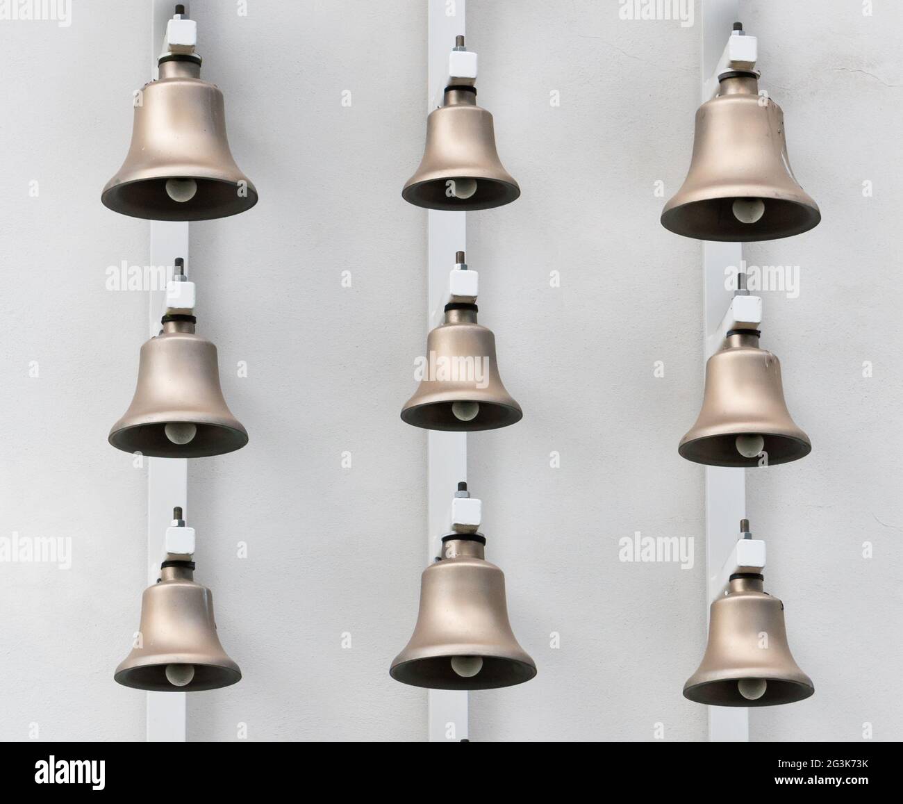 Modern bronze bells Stock Photo - Alamy