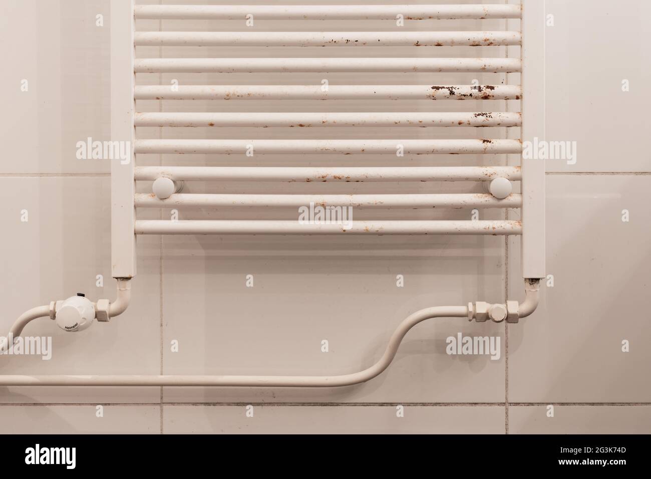Rusty household cast iron radiator Stock Photo - Alamy