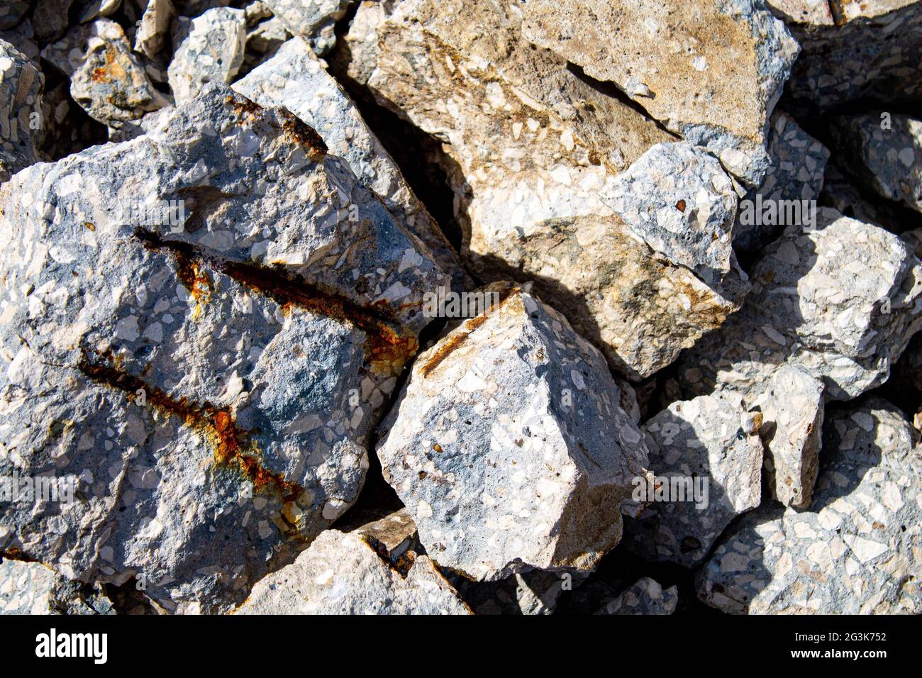 The wreckage of the house. Pieces of the wall on the ground. The ...