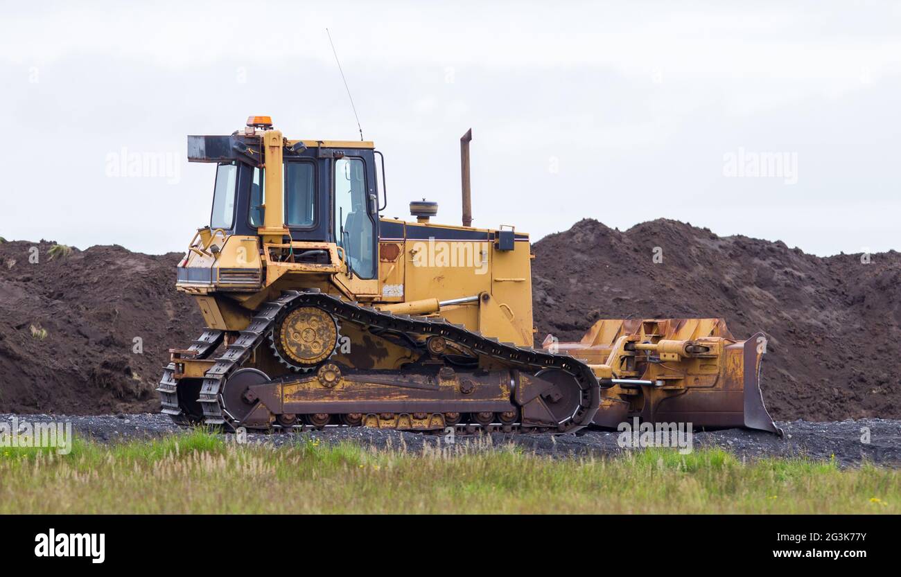 Bulldozer in the field Stock Photo - Alamy