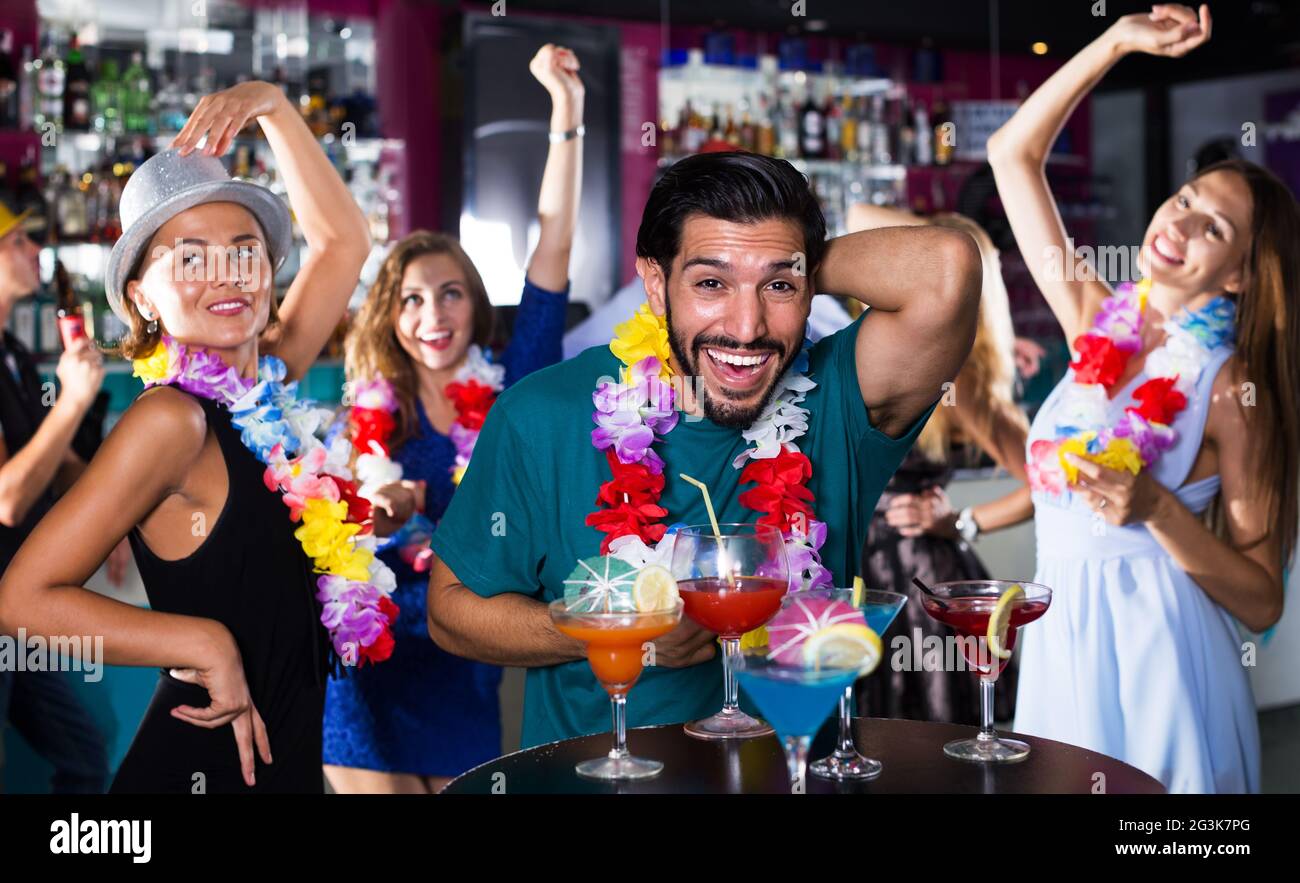 Man dancing on hawaiian party Stock Photo - Alamy