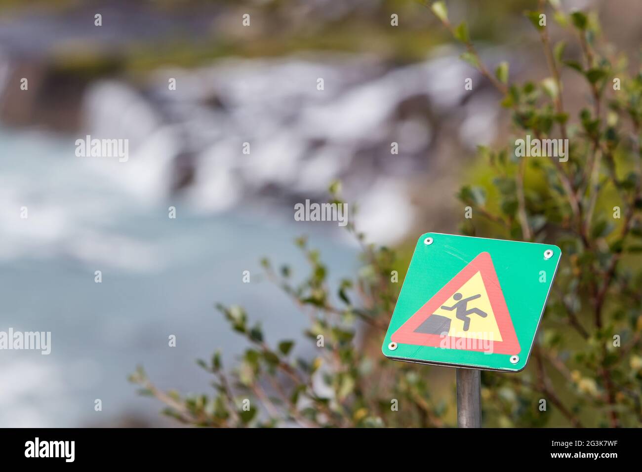 Green square sign - Warning for risk of falling Stock Photo - Alamy