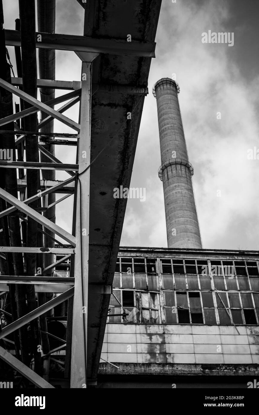 Vertical grayscale shot of an old factory Stock Photo - Alamy