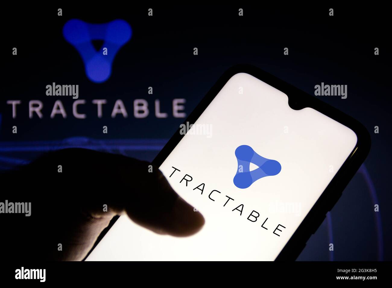 In this photo illustration, a Tractable logo seen displayed on a ...