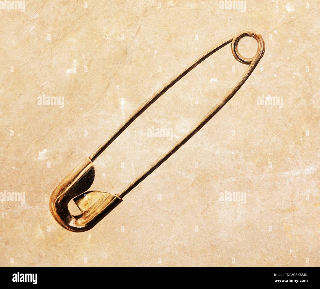Regular safety pin Stock Photo - Alamy