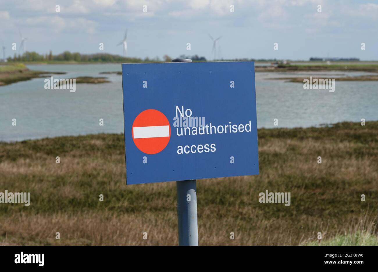 Large sign banning unauthorized access on a marsh Stock Photo - Alamy