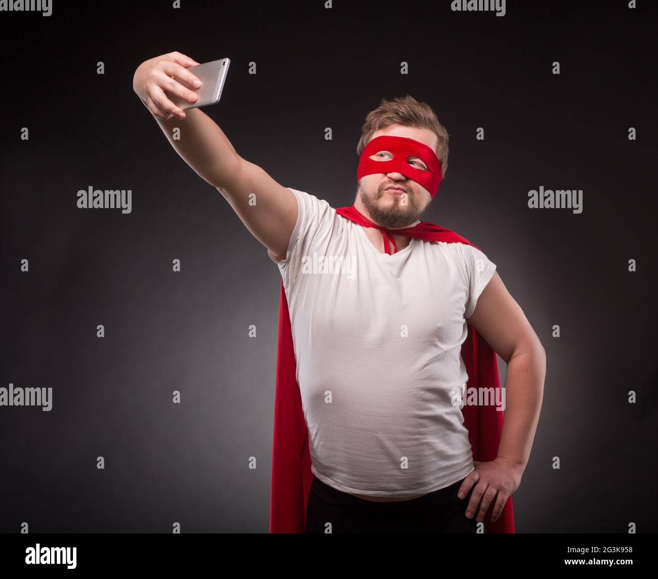 Super hero man making photos Stock Photo - Alamy