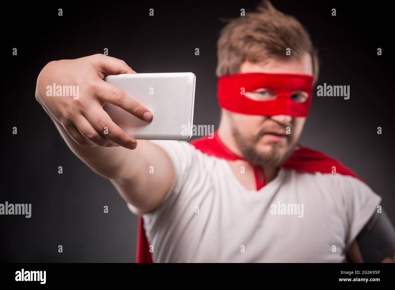 Super hero man making photos Stock Photo - Alamy