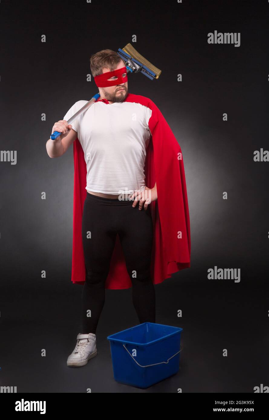 Super hero with cleaning equipment Stock Photo - Alamy