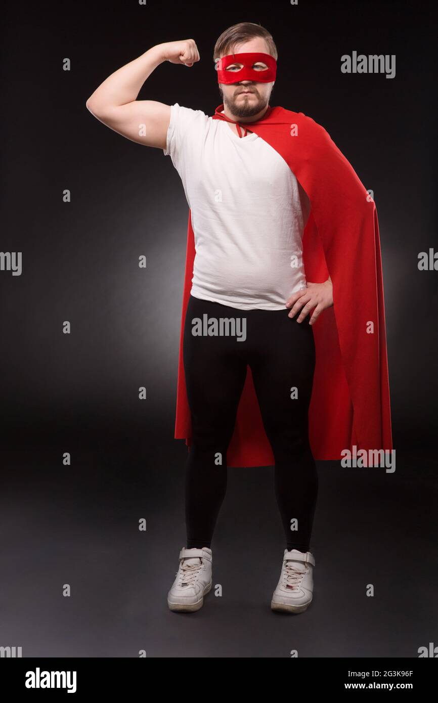 Young super hero man in studio Stock Photo - Alamy