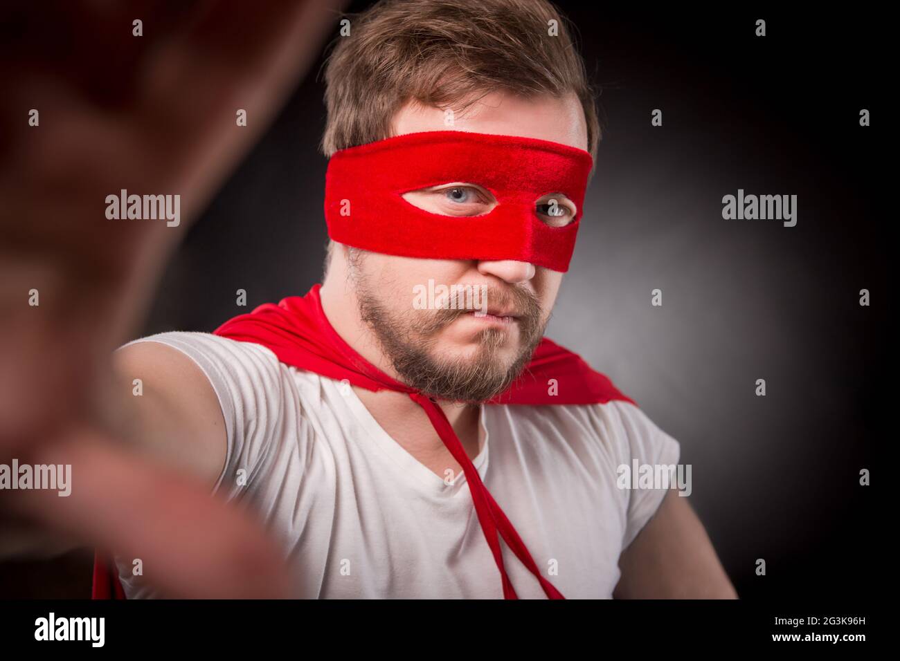 Super hero man making photos Stock Photo - Alamy