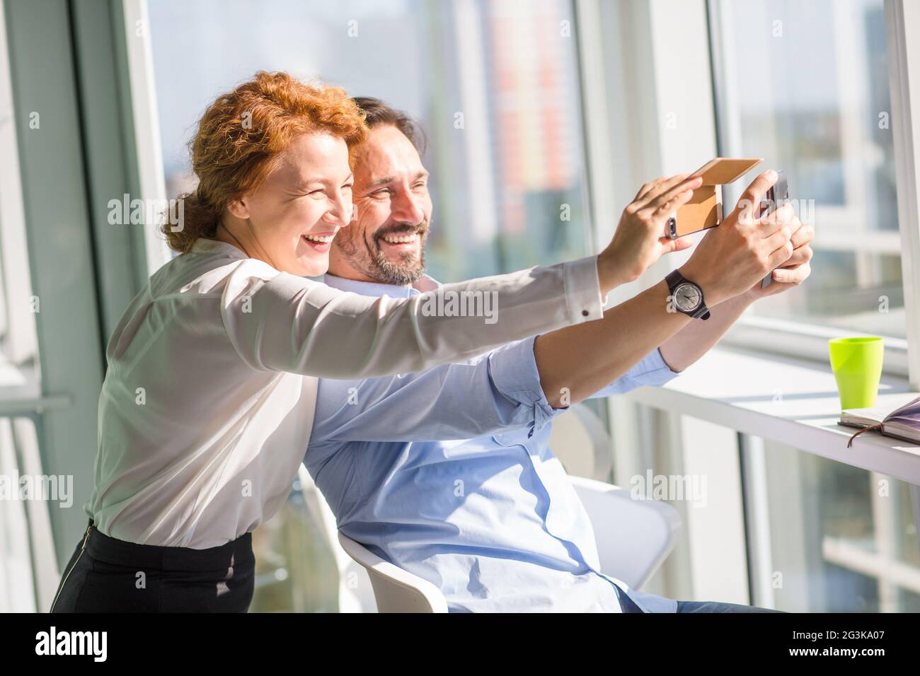Business people making photos on mobile phone Stock Photo - Alamy