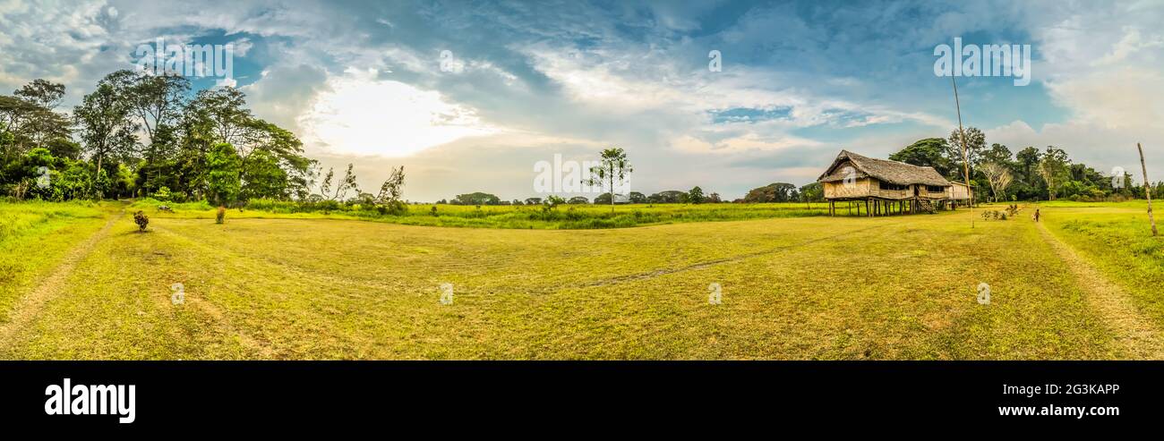 Field with houses Stock Photo - Alamy