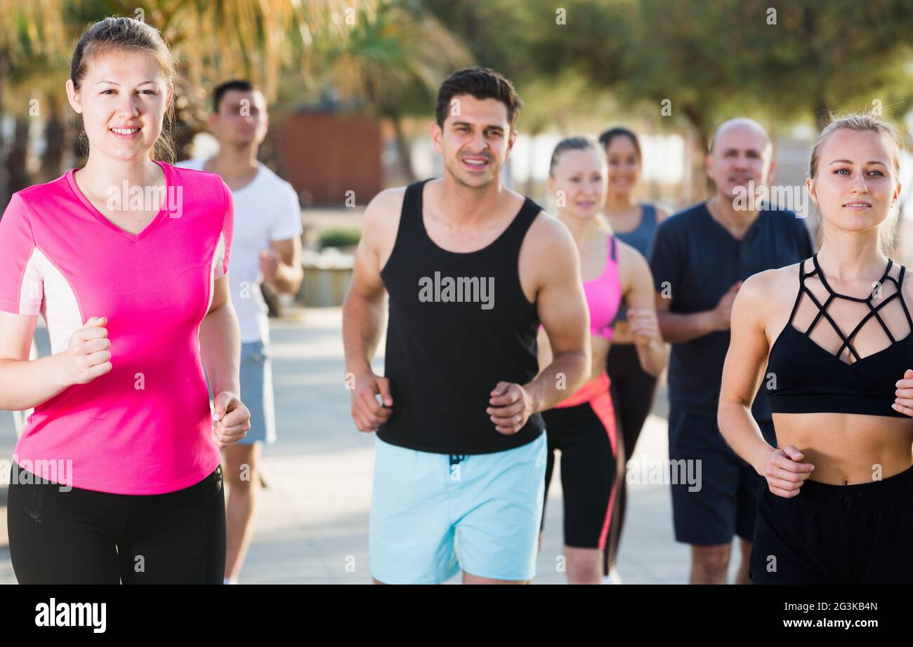 Active people during running training Stock Photo - Alamy