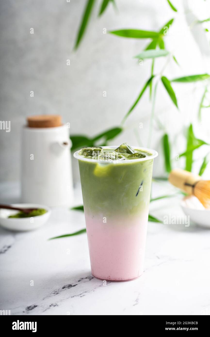 Cold matcha latte in a tall glass on marble Stock Photo - Alamy