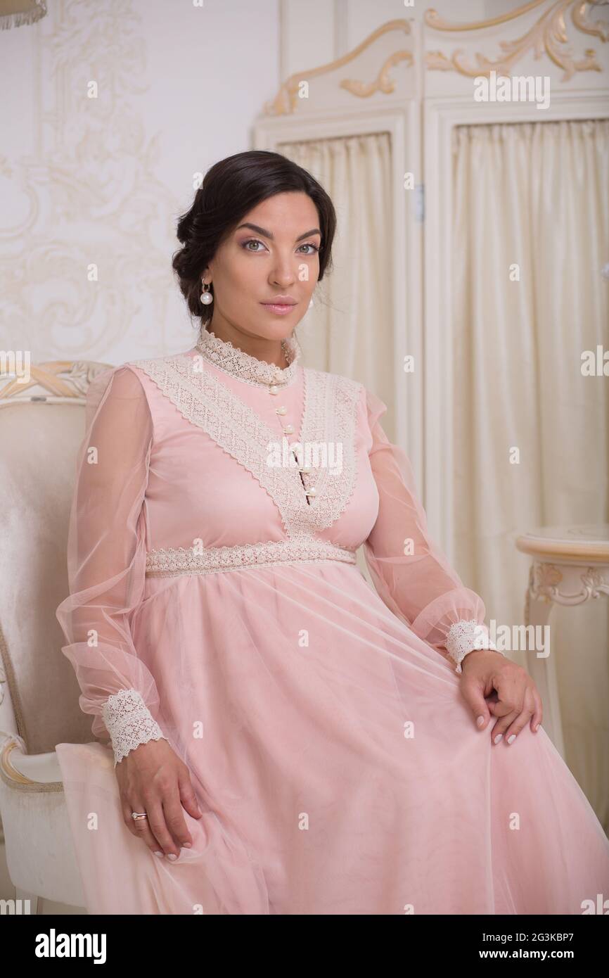 Royal lady in vintage interior Stock Photo - Alamy