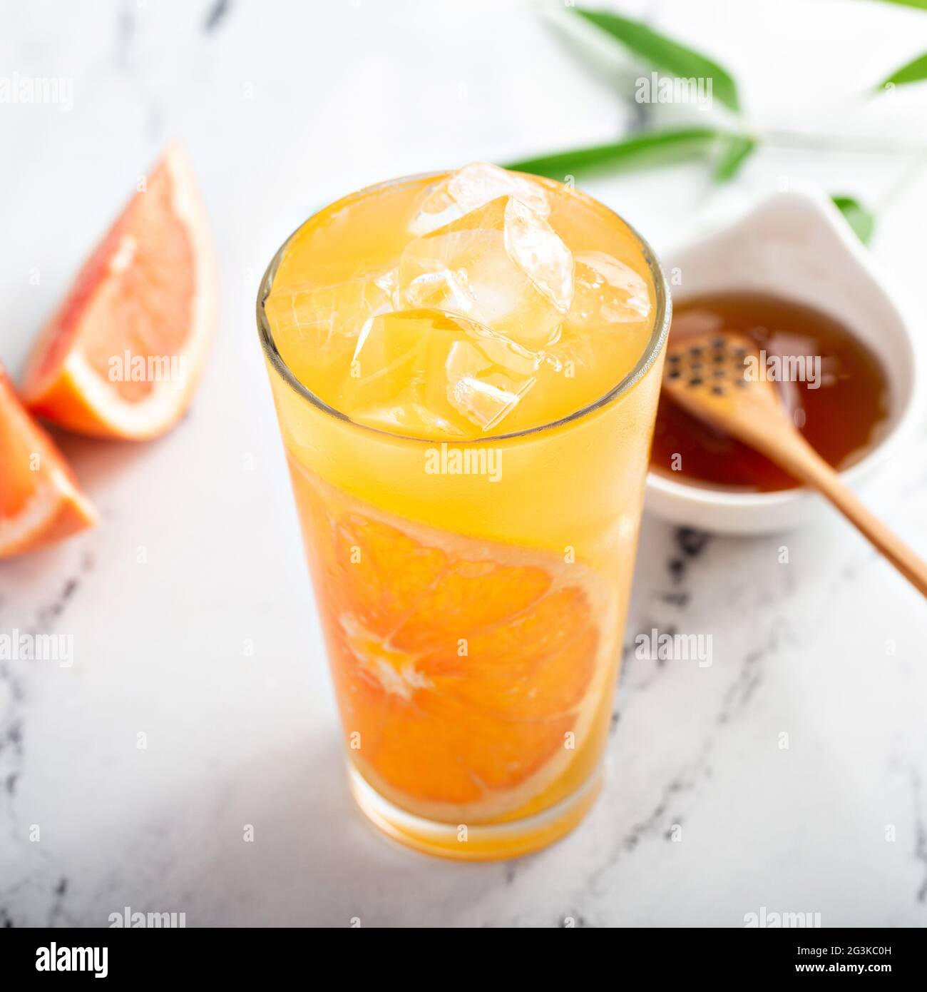 Grapefruit honey jasmine tea served cold with ice Stock Photo - Alamy