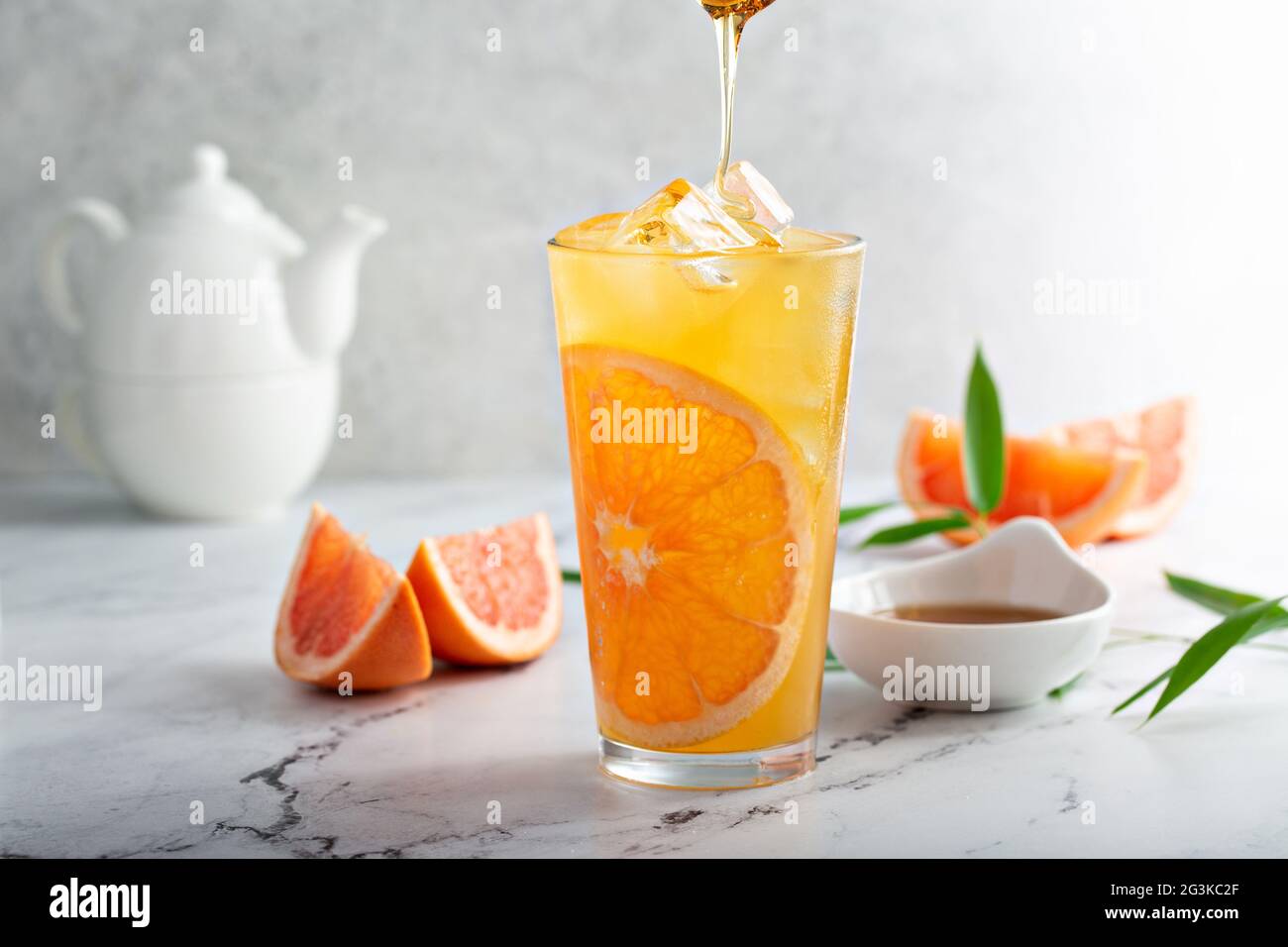 Grapefruit honey jasmine tea served cold with ice Stock Photo - Alamy