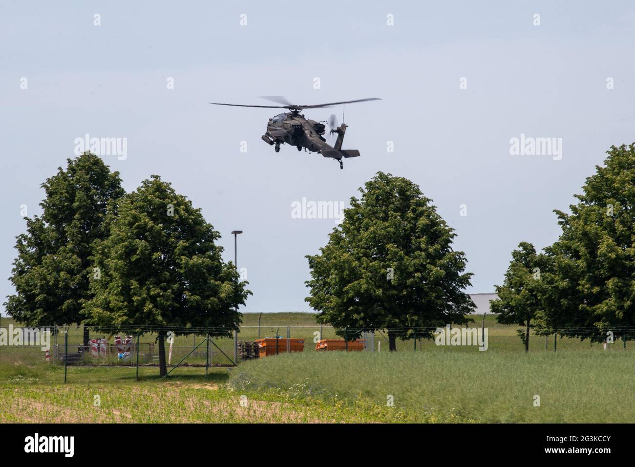 15 June 2021, Bavaria, Katterbach: A military helicopter flies towards ...